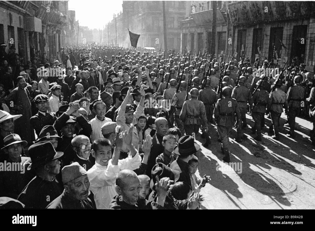 People of Harbin greeting Soviet soldiers of the 1st Far Eastern Front ...