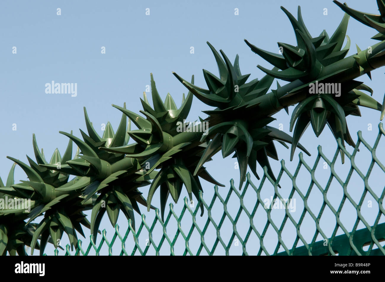 SECURITY FENCE MADE OF PLASTIC SPIKES ON AN ELECTRICITY SUB-STATION ...