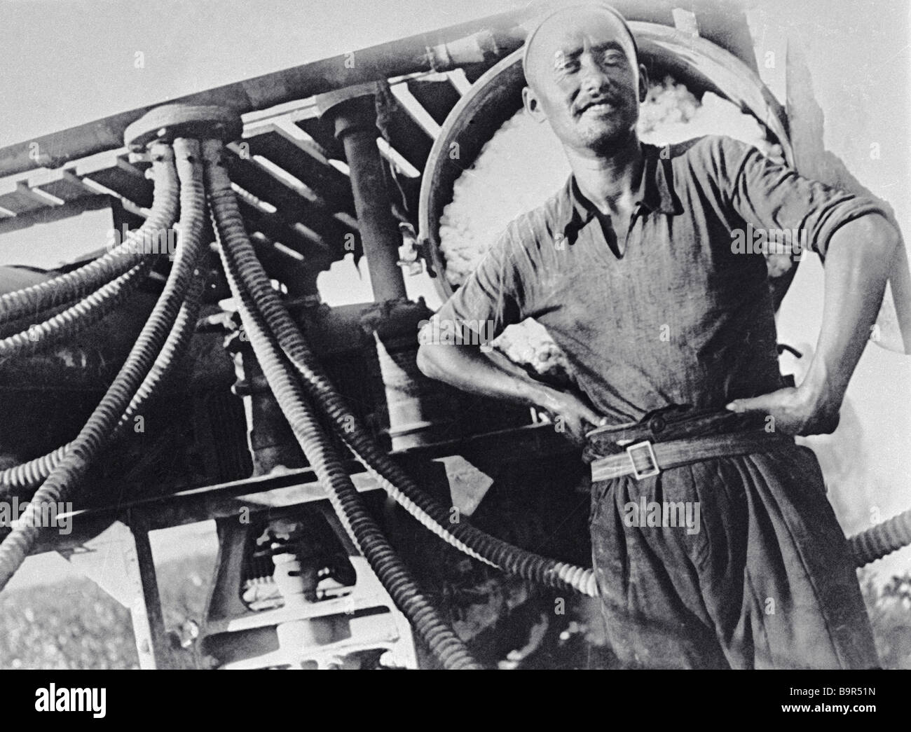 A tractor operator of the first cotton picker Stock Photo - Alamy