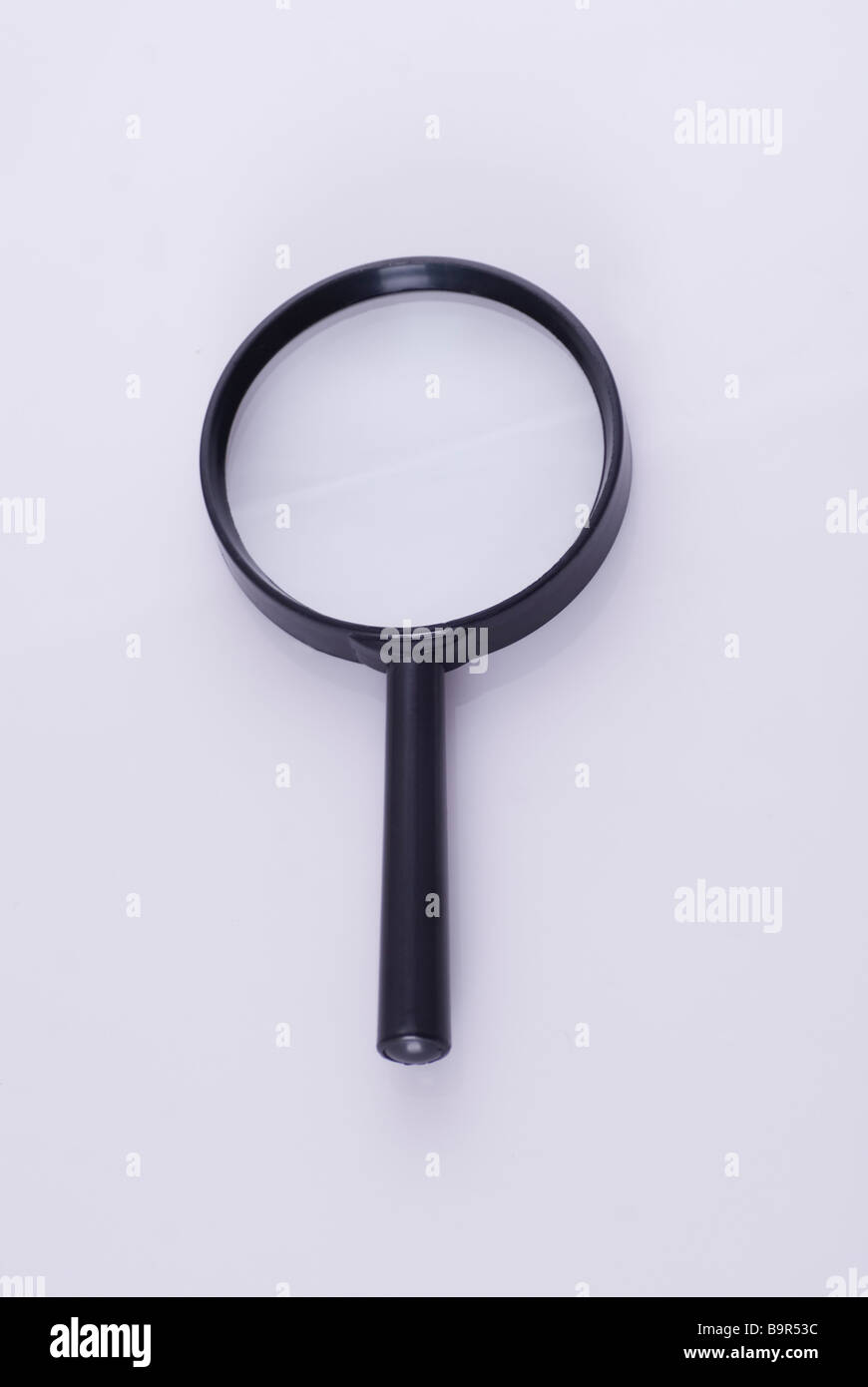 Overhead view of a magnifying glass on a white background Stock Photo ...