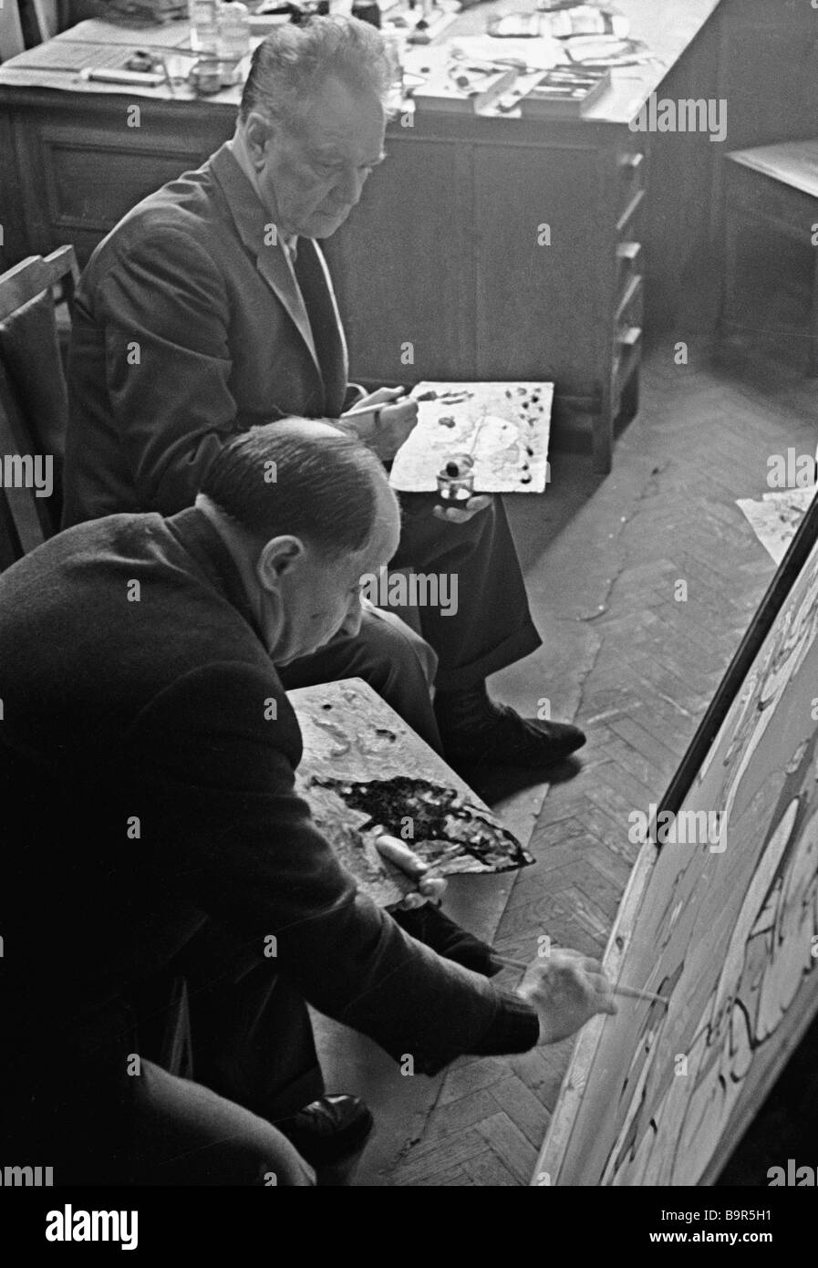 Two of the Kukryniksy artists Porfiry Krylov left and Nikolai Sokolov ...