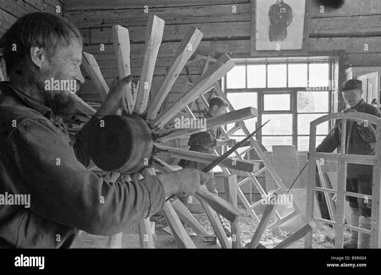 Carpenters at work in the farm s workshop Stock Photo - Alamy