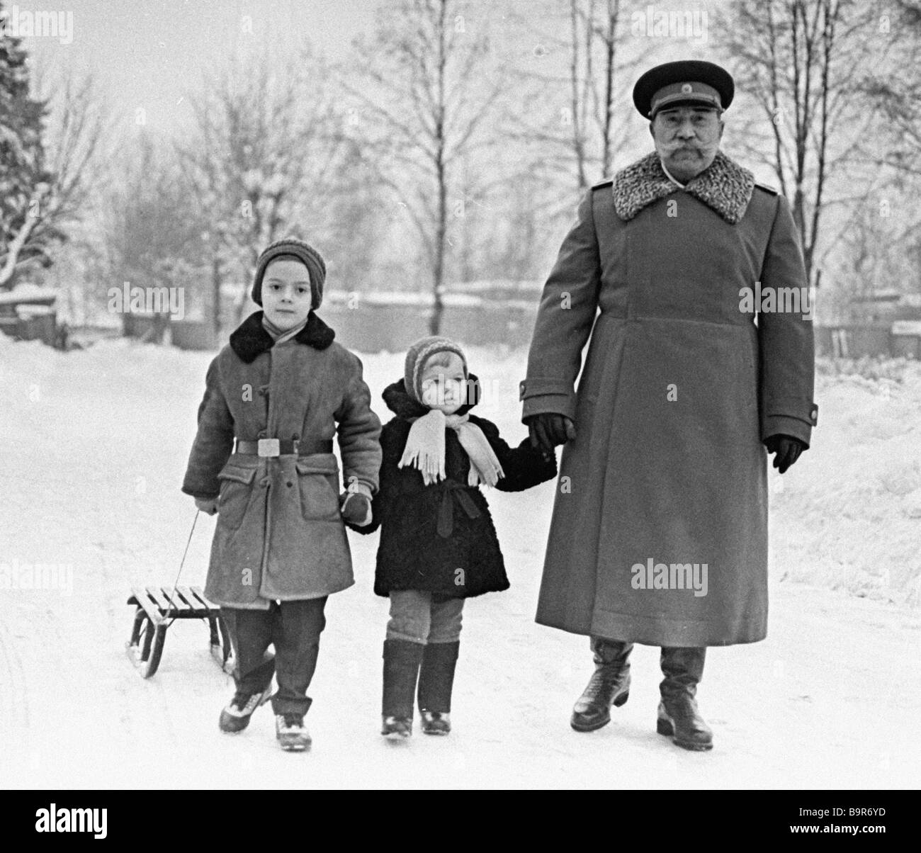 Marshal of the Soviet Union Semyon Budyonny right takes a walk with his ...