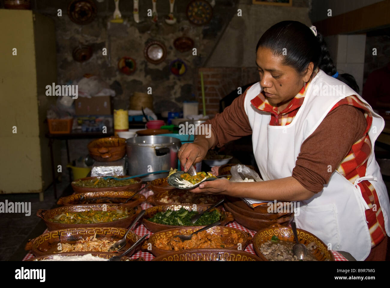 Mexican cuisine, preparing tacos Stock Photo - Alamy