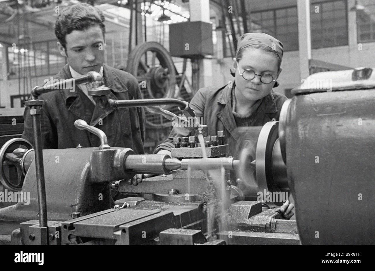 Students of a vocational secondary school learning how to operate a ...