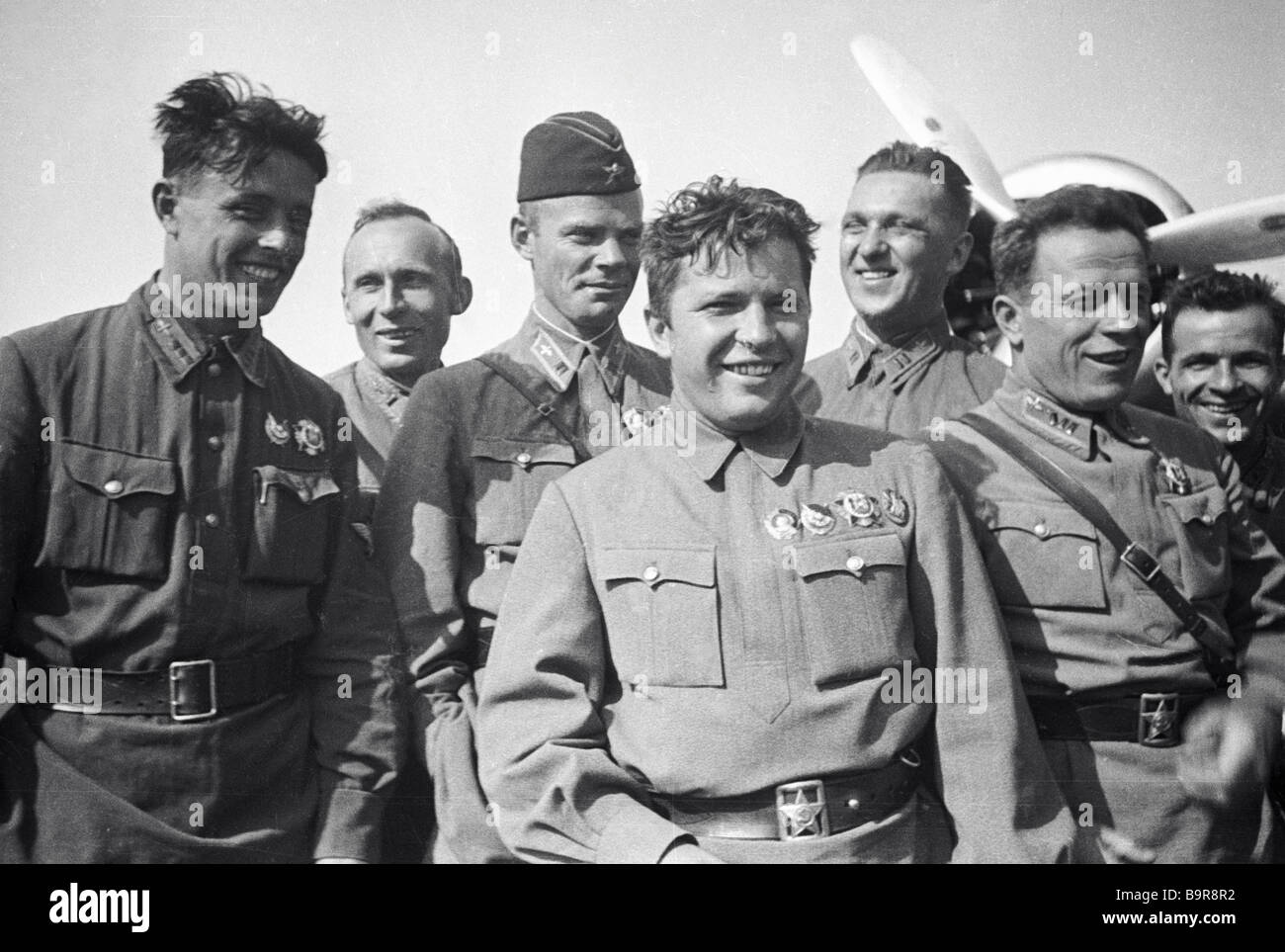 Soviet pilots Sergei Gritsevets third left and Grigory Kravchenko center Twice Heroes of the ...