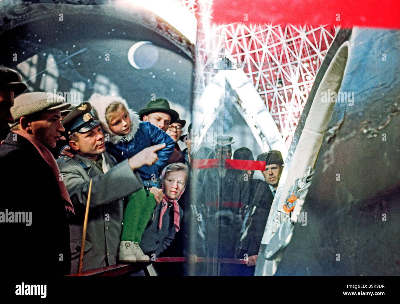 Cosmonaut Yury Gagarin second from left showing his spacecraft to his ...