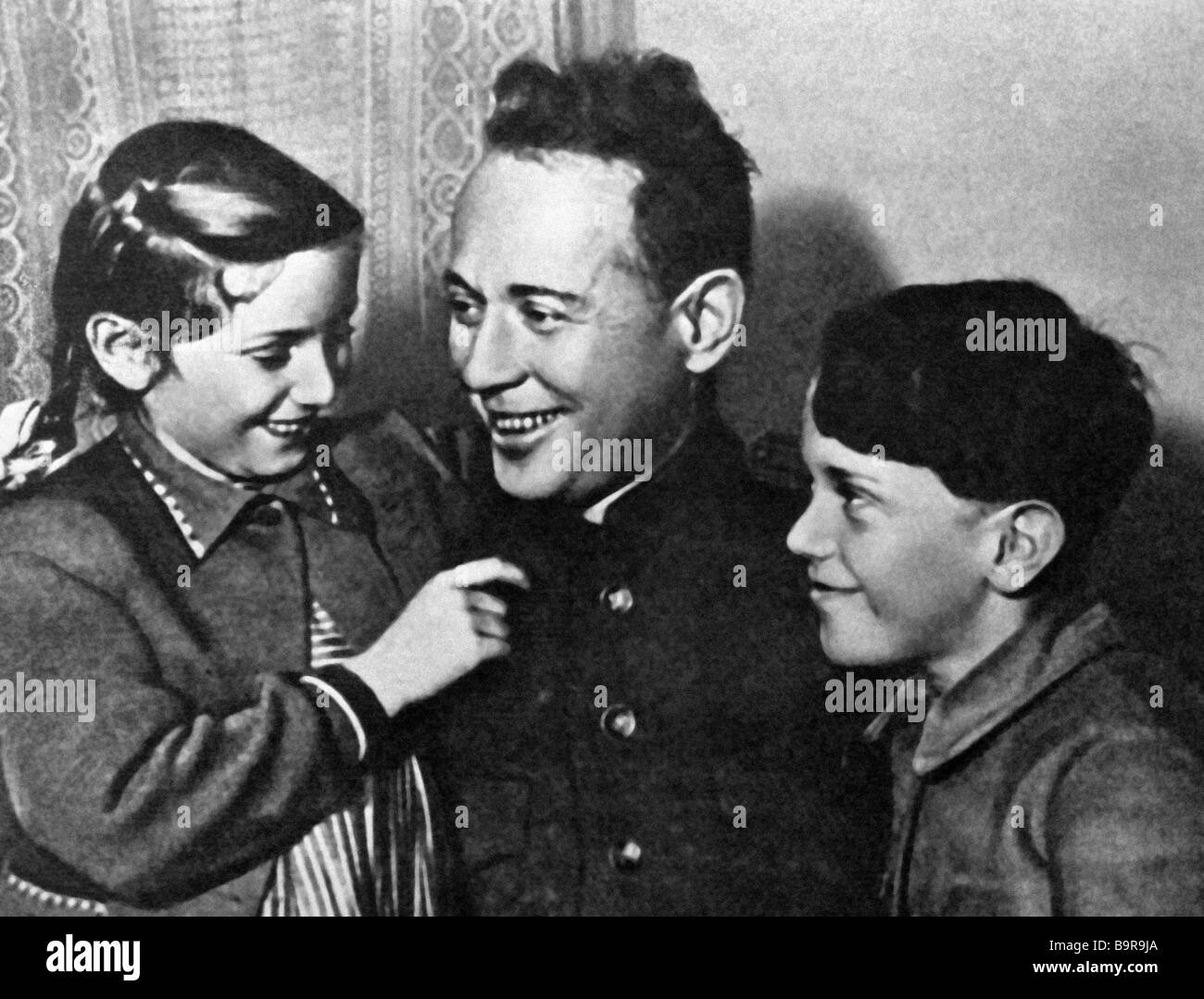 Soviet writer Mikhail Sholokhov center with his daughter Masha left and ...