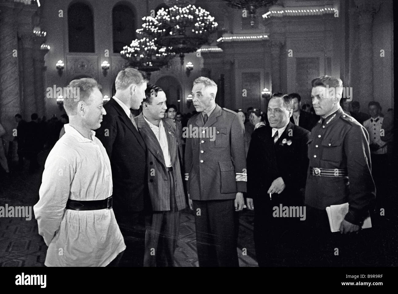 Russian Soviet writer Mikhail Sholokhov left and face worker from ...