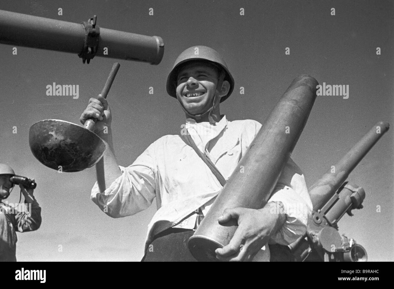 Cook of the Frunze destroyer G Pronin with a ladle and a shell The ...