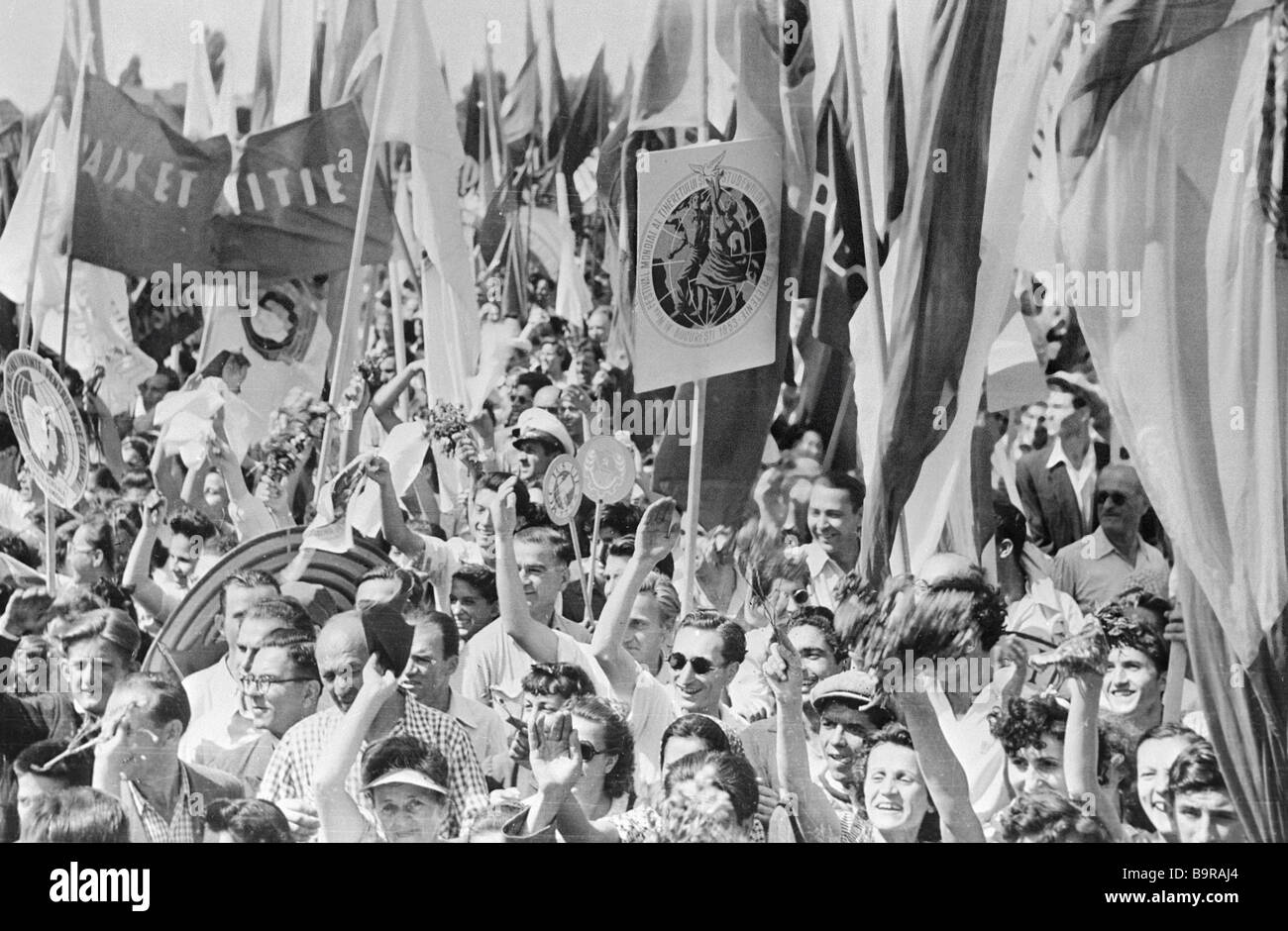 Many countries delegates parade in the streets with flags and streamers ...