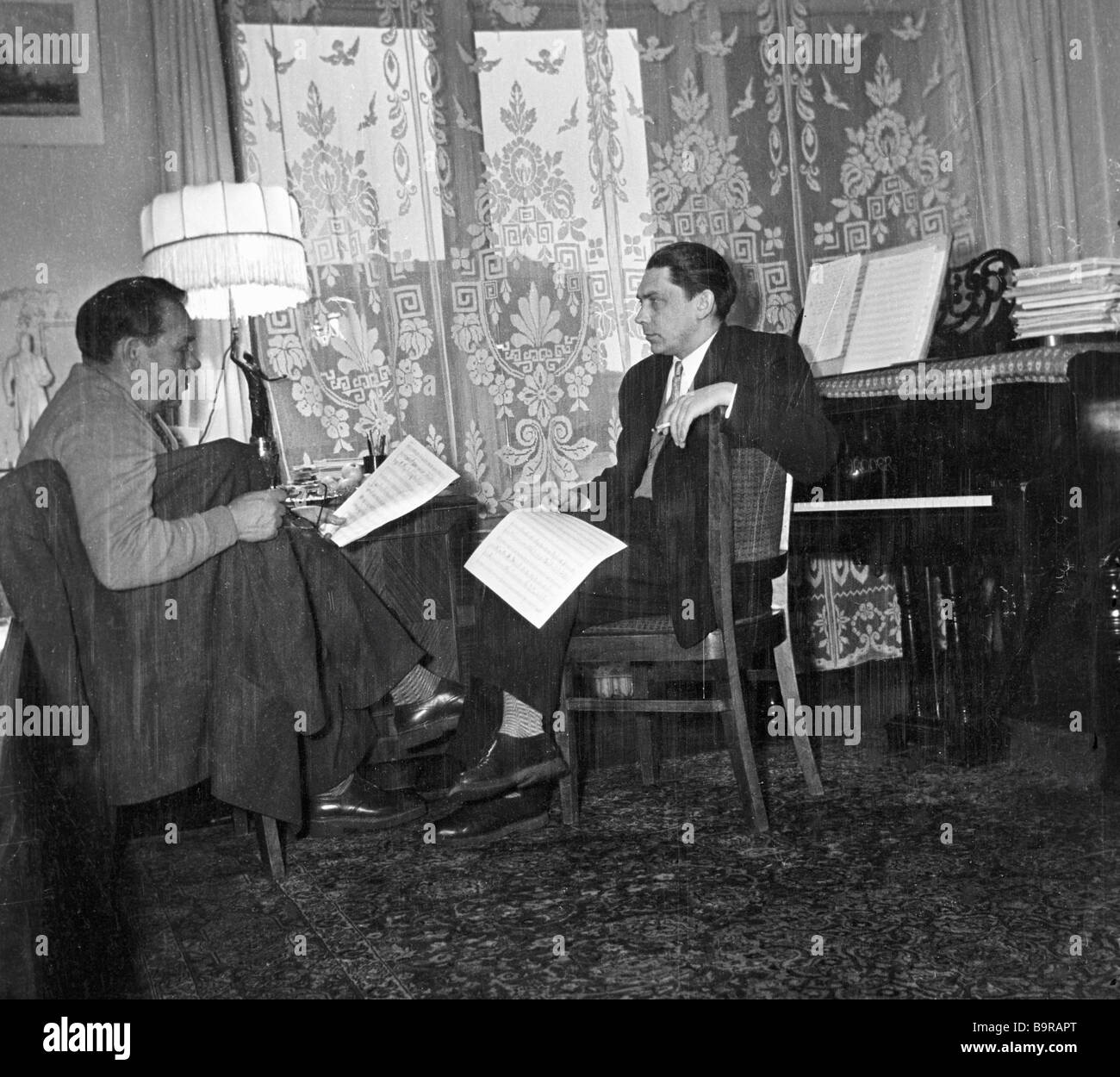 The composer Anatoly Novikov left talking to his son Konstantin right a ...