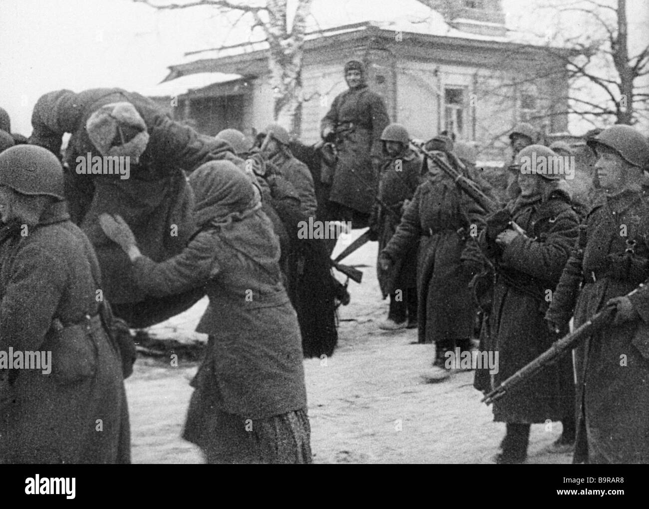 An old woman greeting Soviet soldiers who liberated her village A shot ...