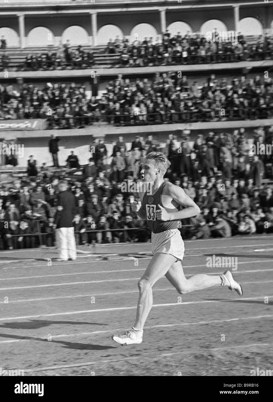 Soviet long distance runner Olympic champion Vladimir Kuts on the track ...