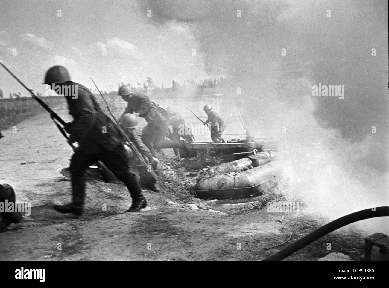 Soviet soldiers crossing a river The North Western Front Stock Photo ...