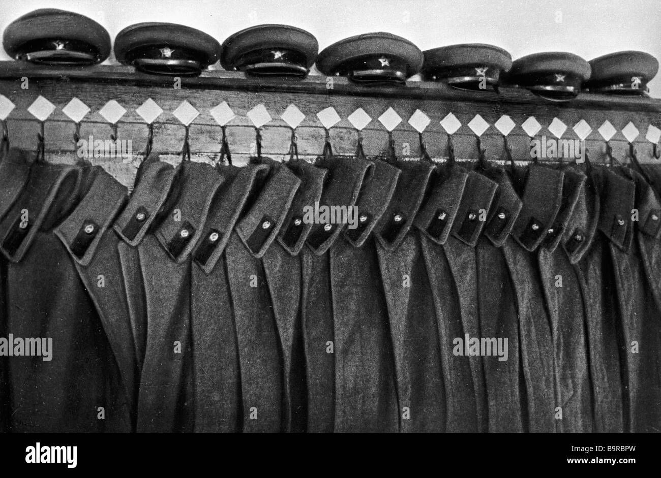 Frontier guard uniform hanging in the barracks Stock Photo - Alamy