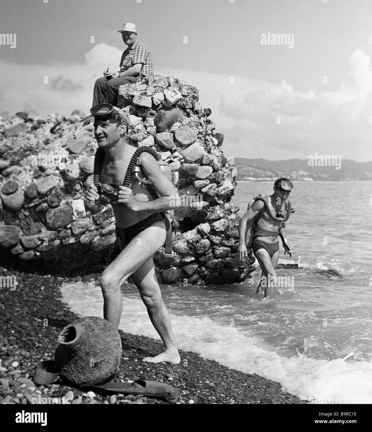 Scuba divers searching for artifacts from ancient Dioscurias Stock ...