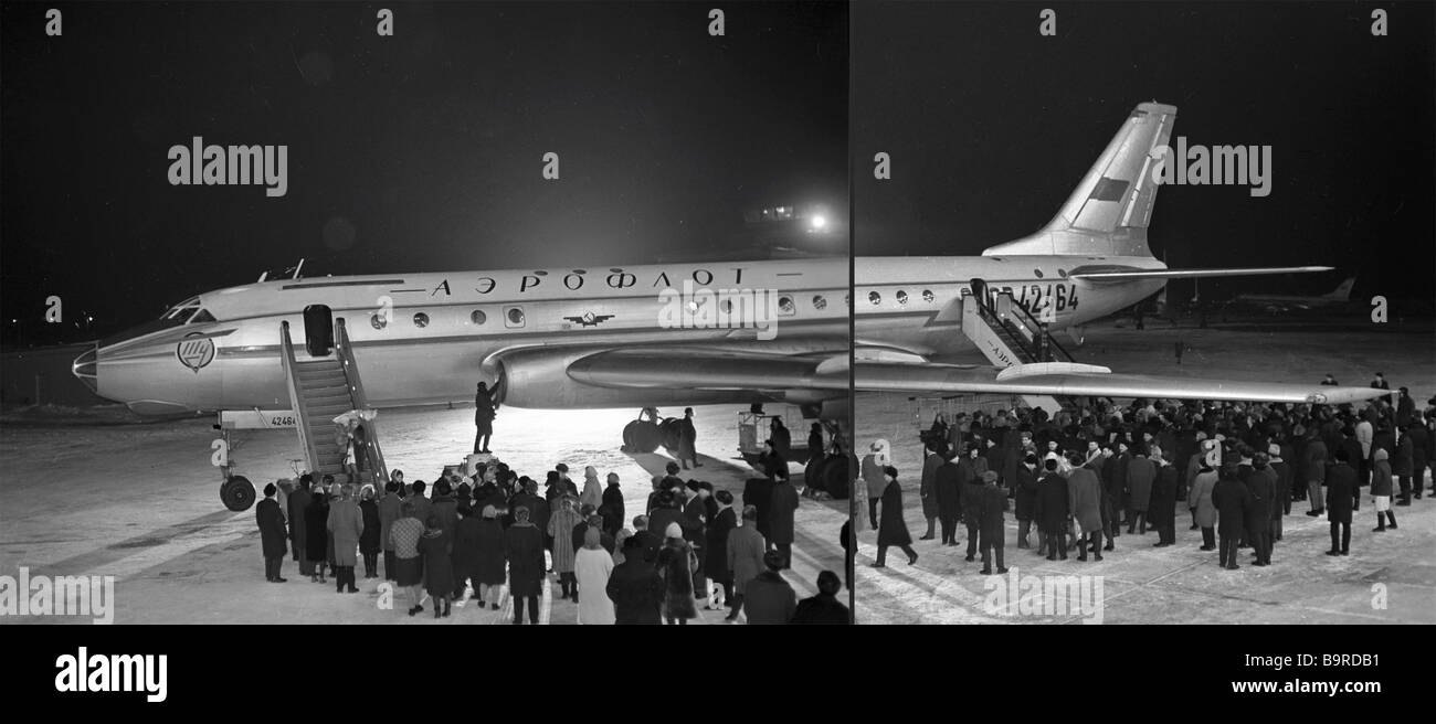Soviet women and children leave Tupolev Tu 104 Camel jetliner that ...