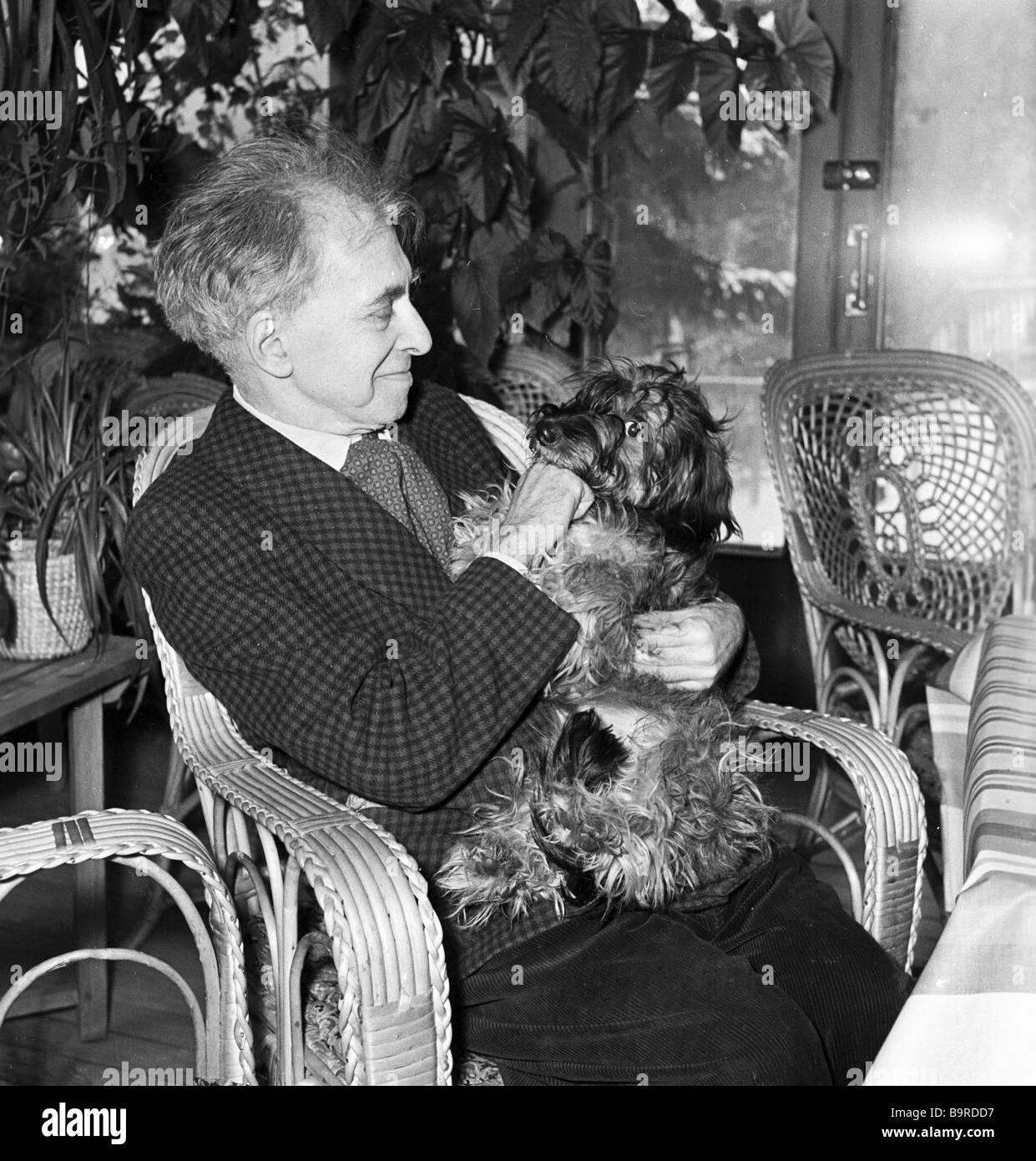 Soviet writer Ilya Ehrenburg with his dog Stock Photo - Alamy
