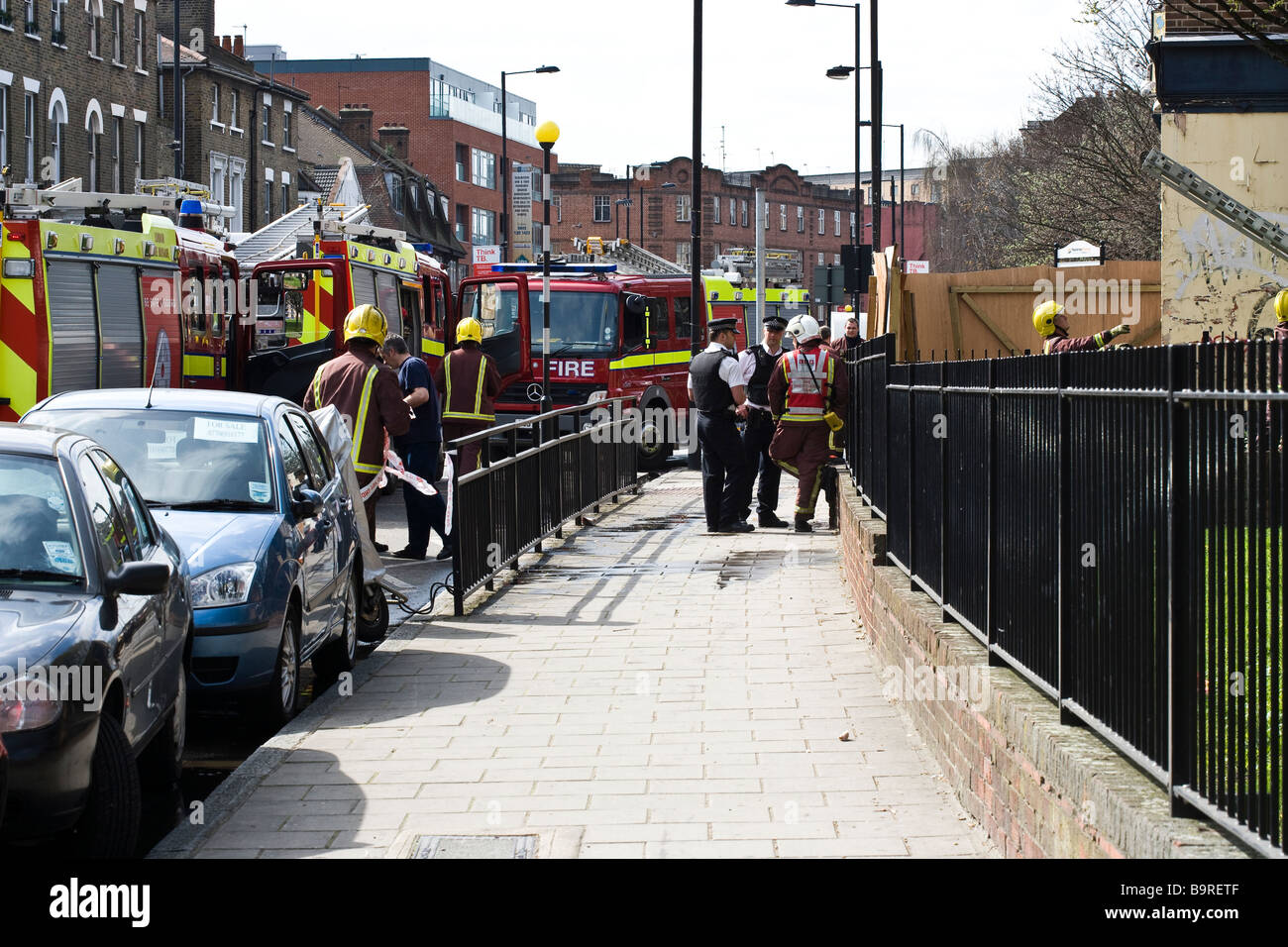 emergency services fire engine fire men police uk Stock Photo - Alamy