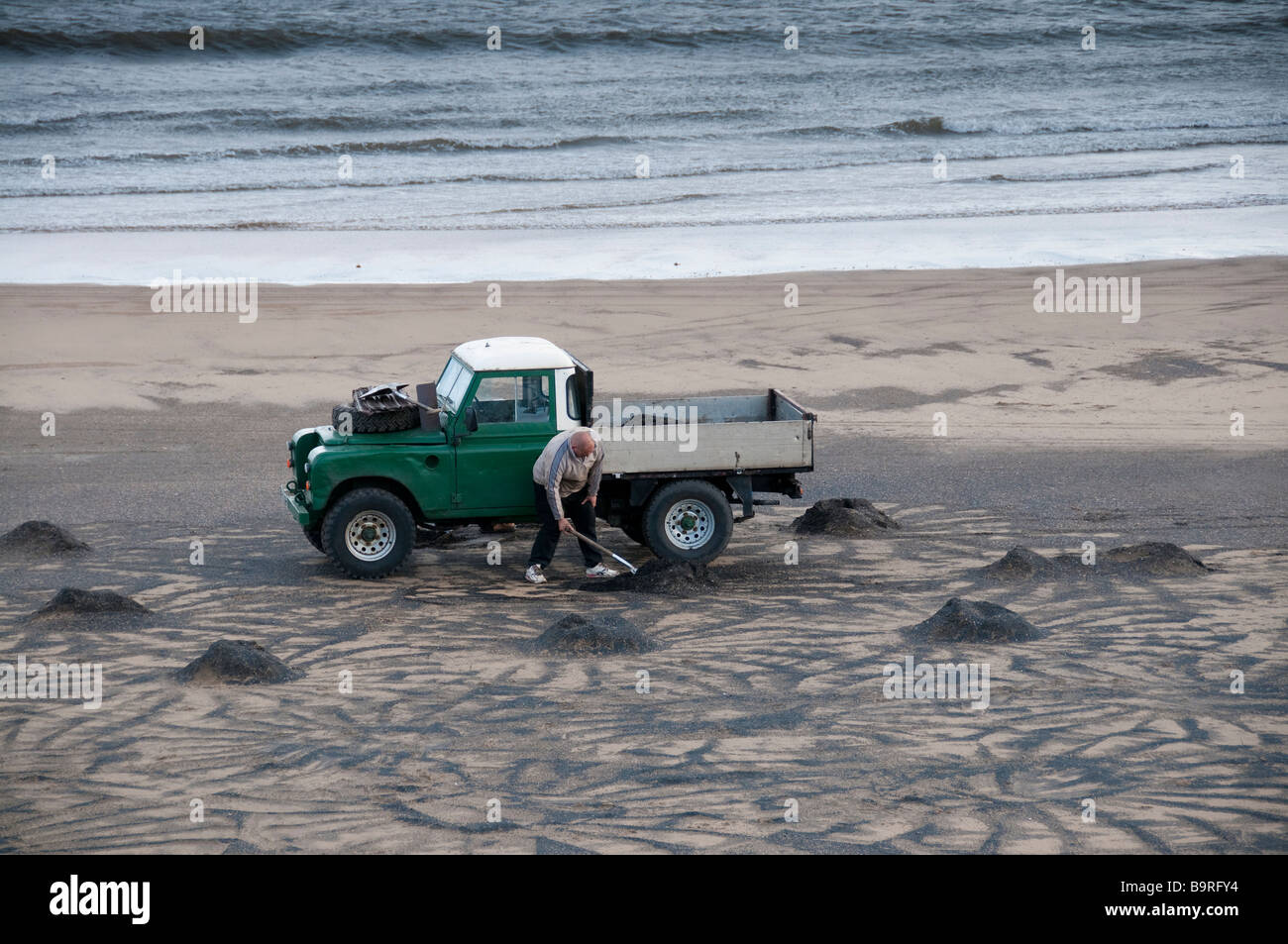 Cleaning up the beach at Hartlepool's seaside Stock Photo - Alamy