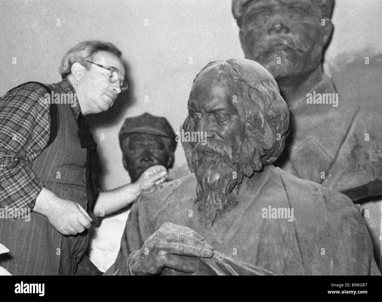 Belorussian sculptor Zair Azgur working on the sculptural portrait of ...