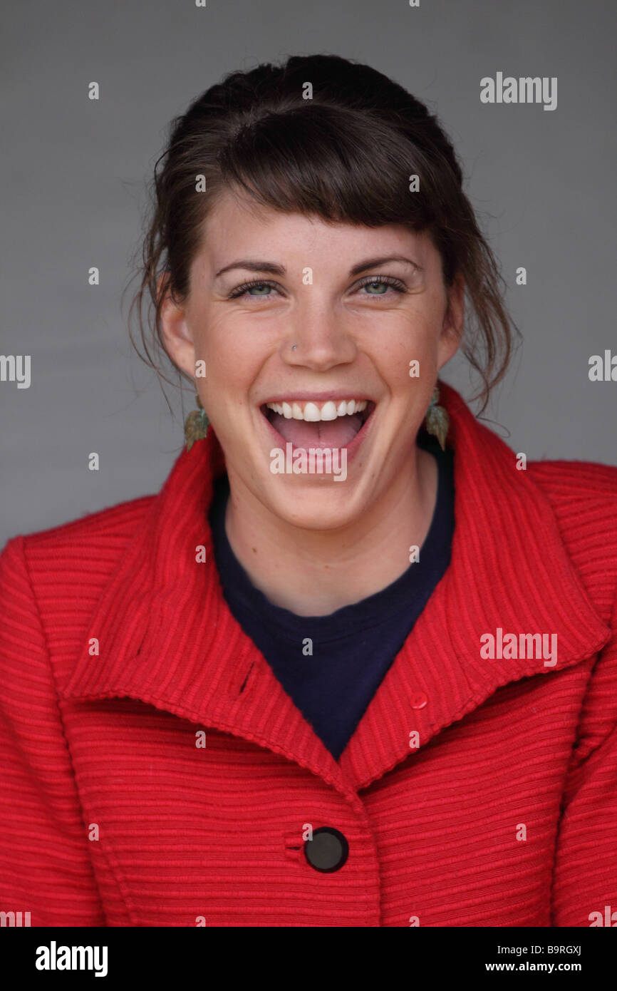 happy young woman with a very big smile Stock Photo - Alamy