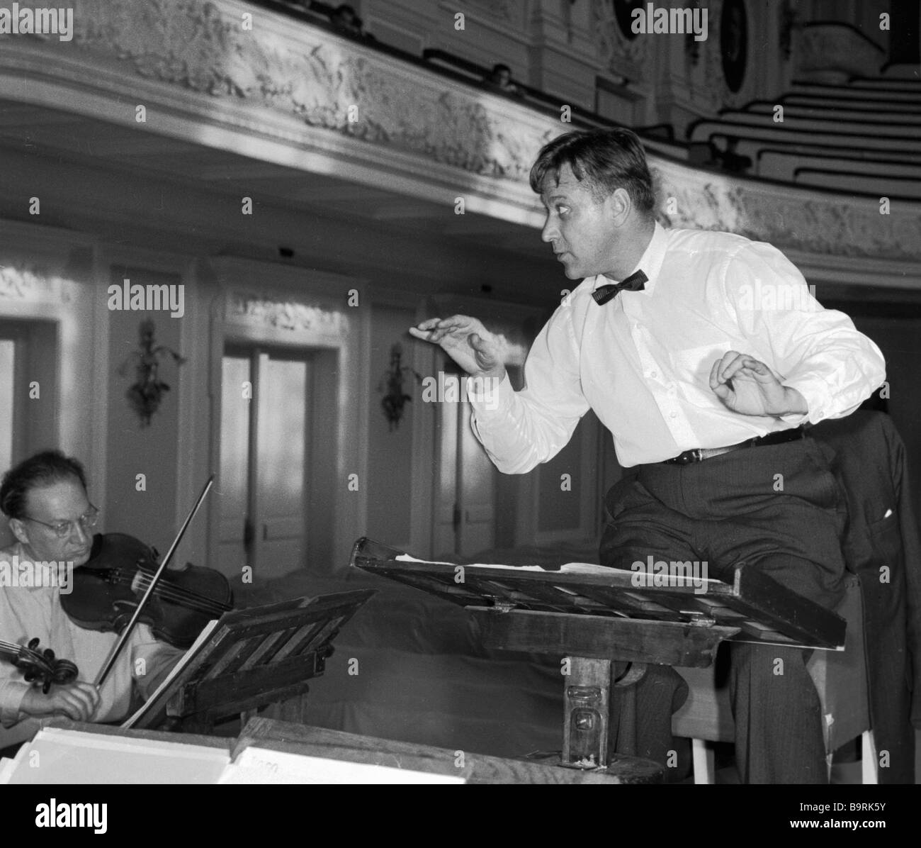 Orchestra conductor Kirill Kondrashin during rehearsal Stock Photo - Alamy