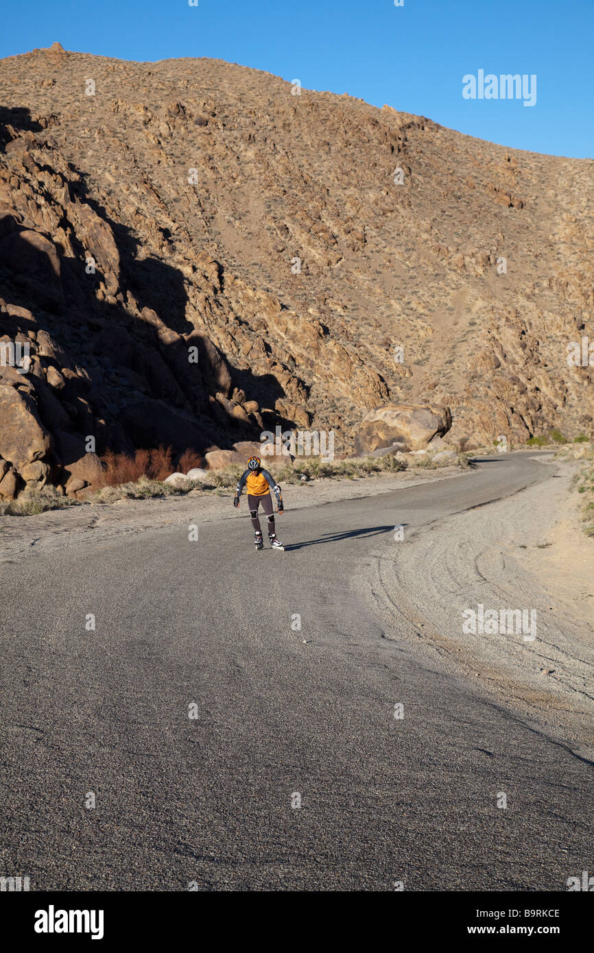 Man skating through rocks Stock Photo - Alamy
