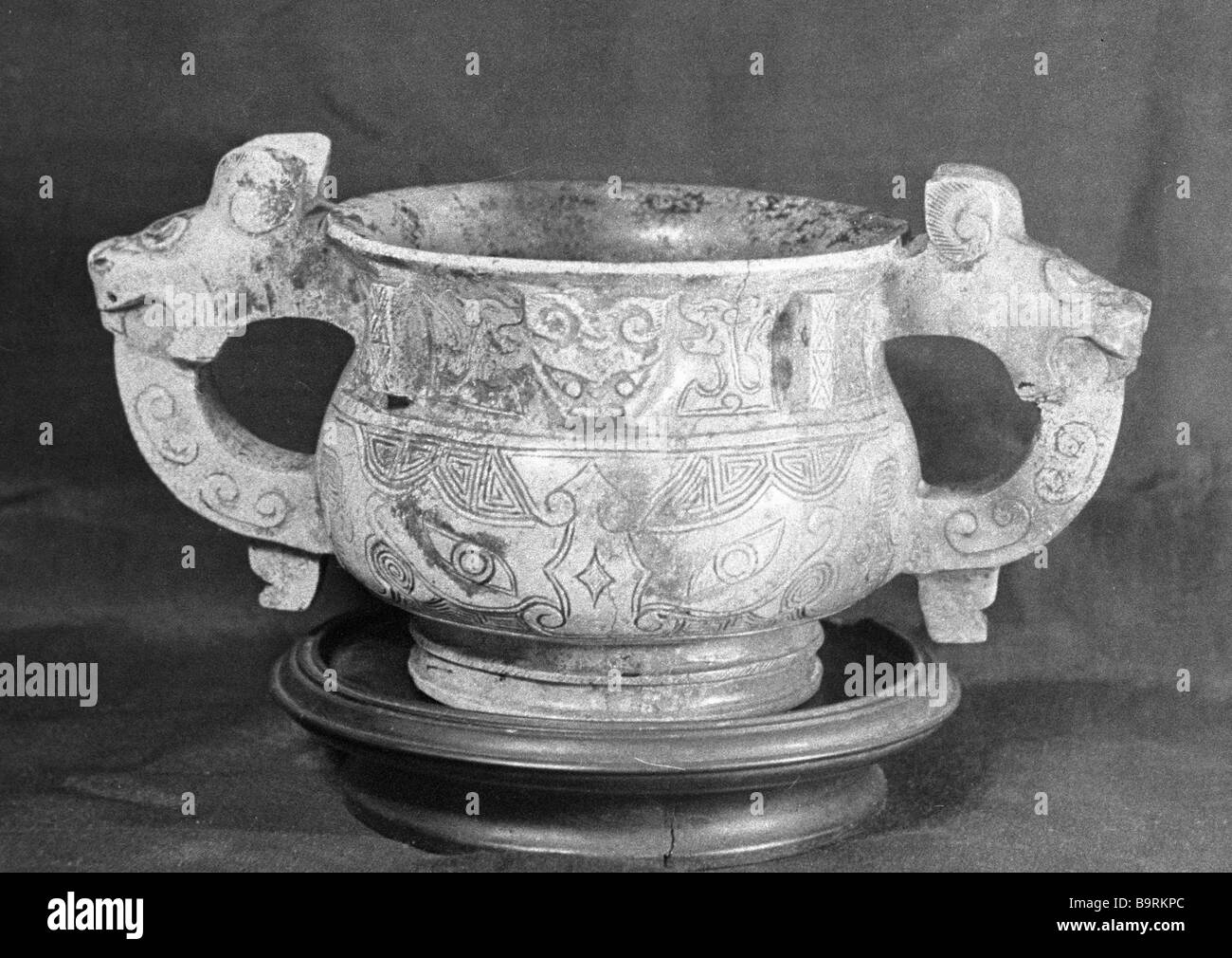 An offering cup made of carved stone from the collection of the Museum ...