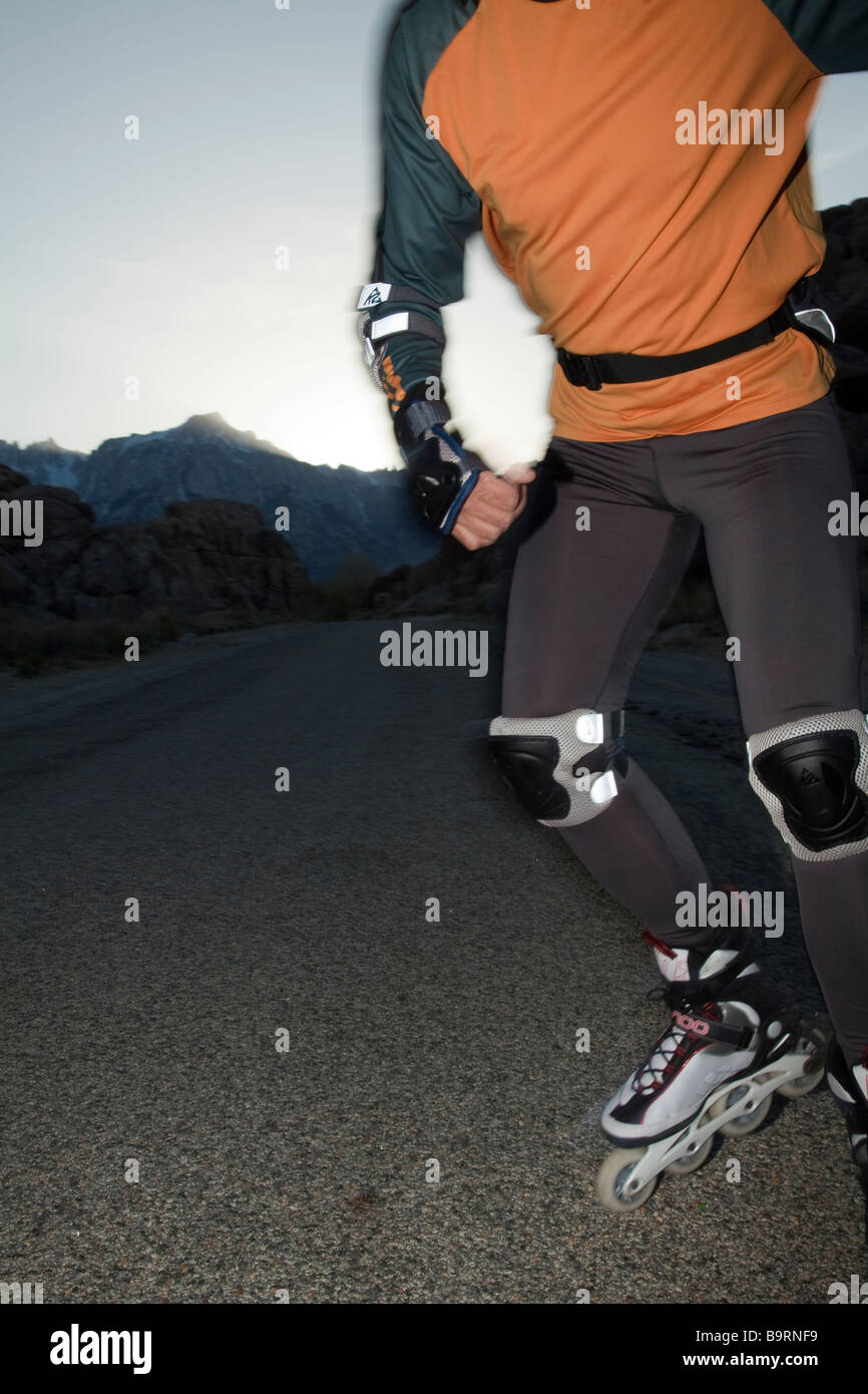 Man skating through rocks Stock Photo - Alamy