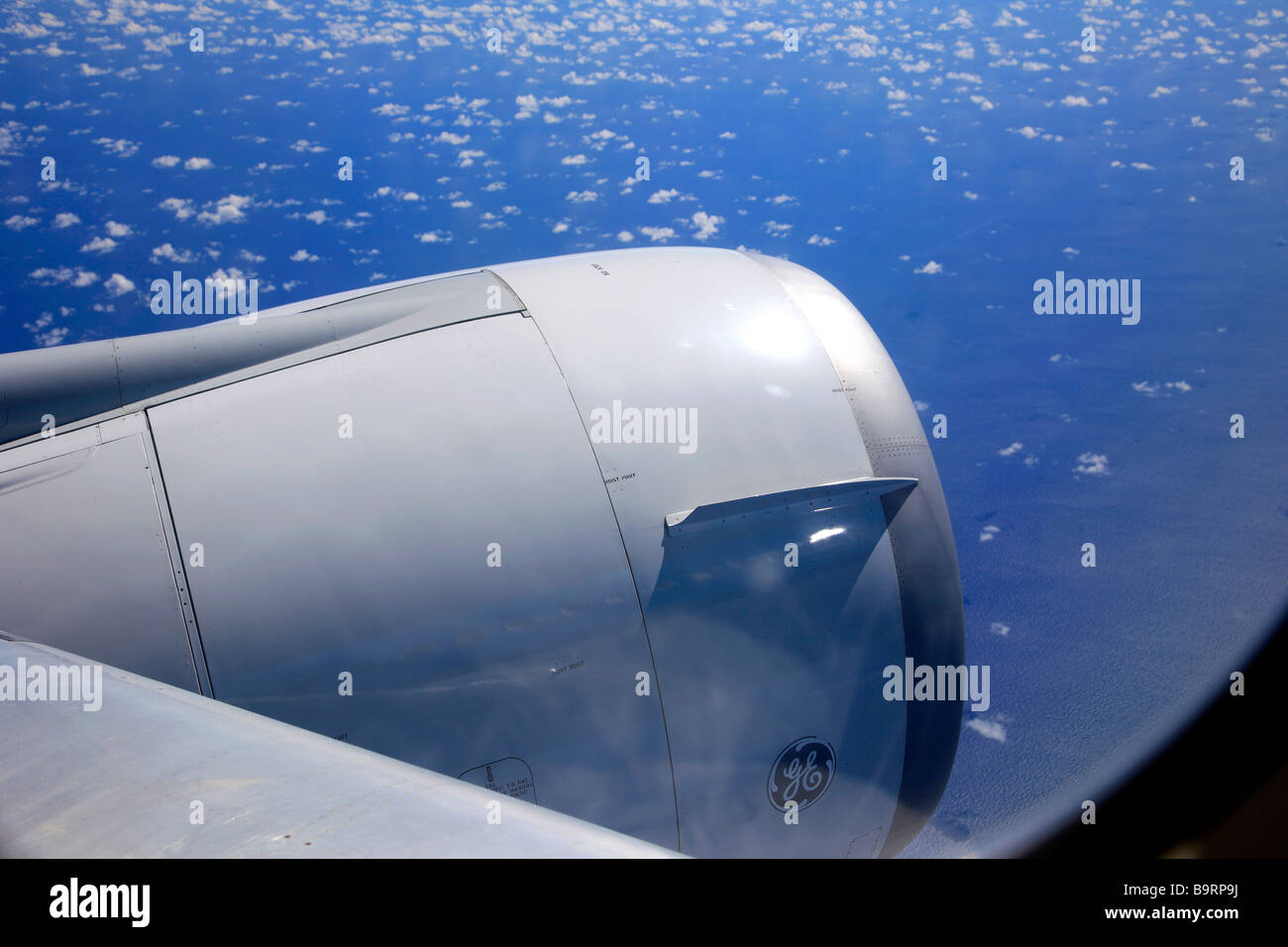 View from Aeroplane window of McDonald Douglas MD-11 jet engine over ...