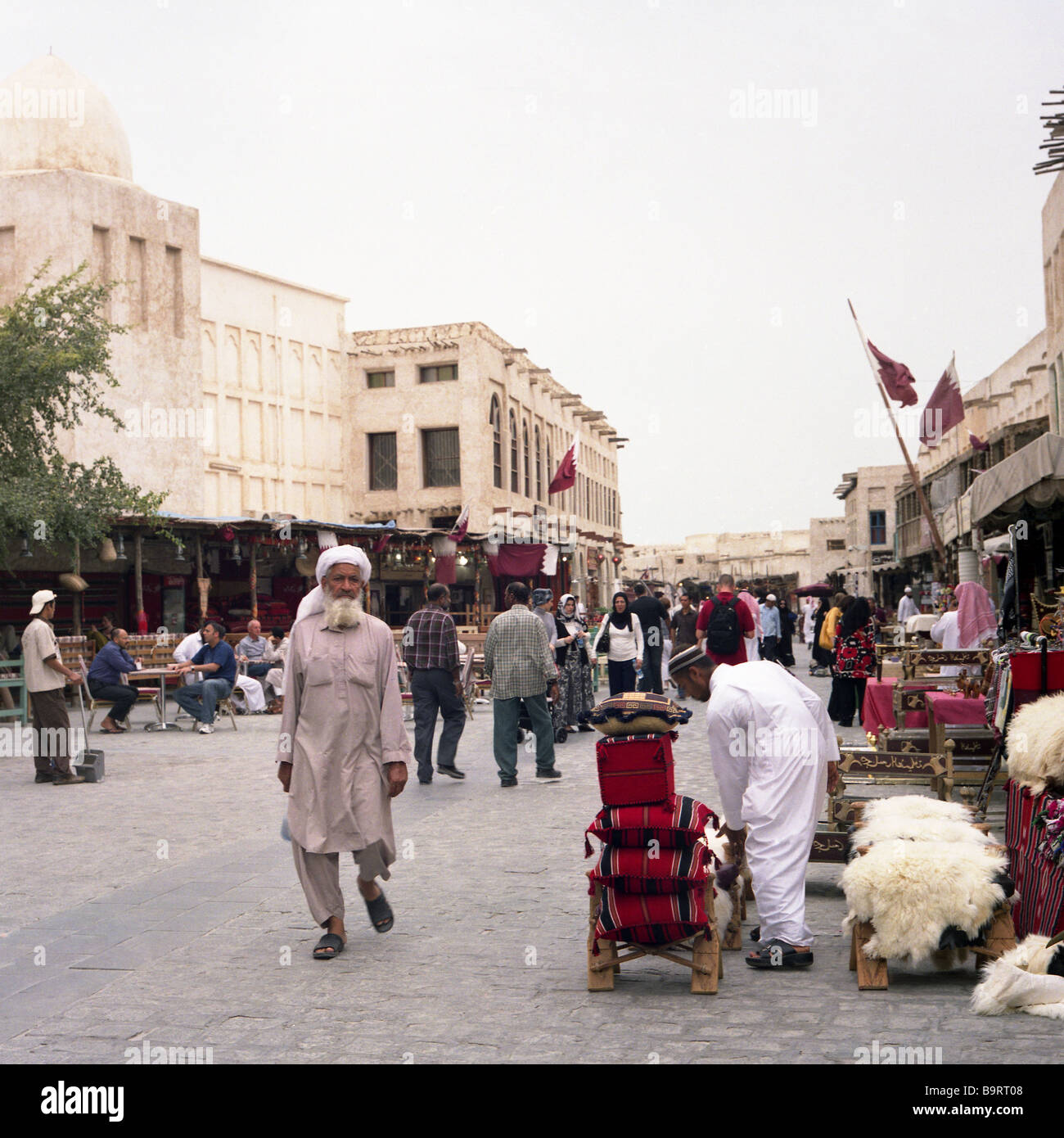 A typical afternoon scene in the main street of Souq Waqif Doha Qatar ...