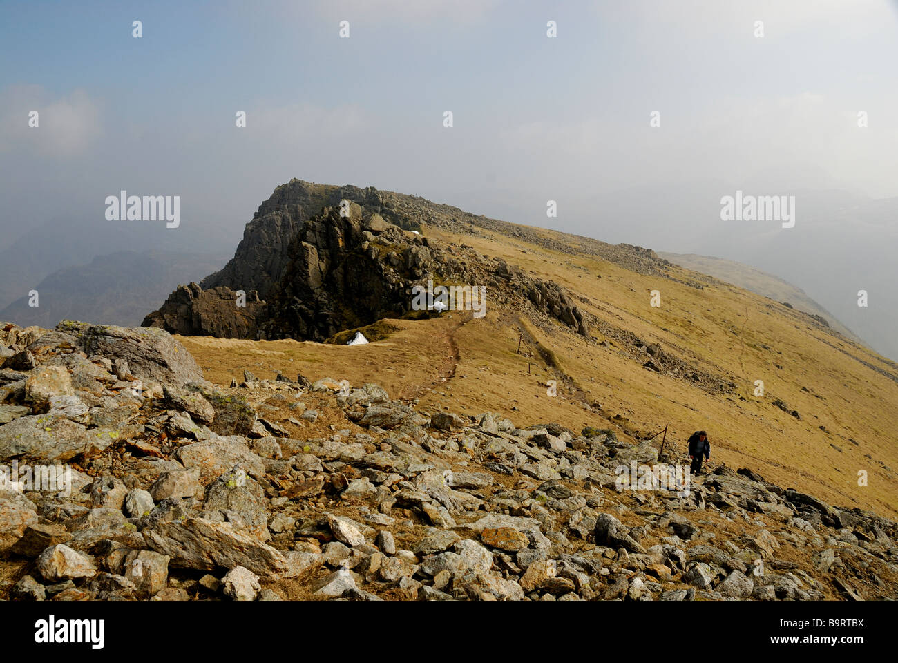 Lone walker, Summit of Pillar, Lake District Stock Photo - Alamy