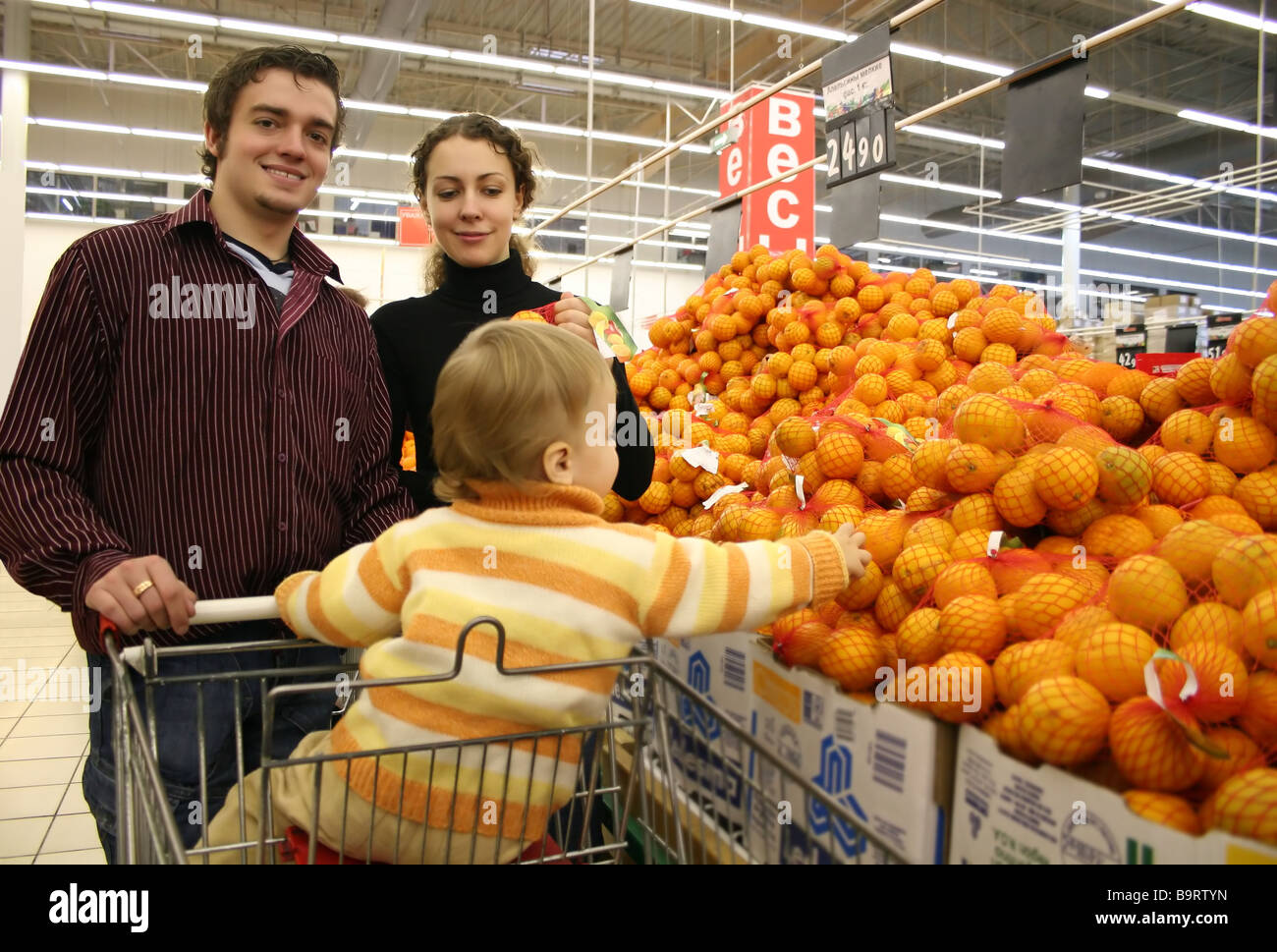 family in shop Stock Photo - Alamy