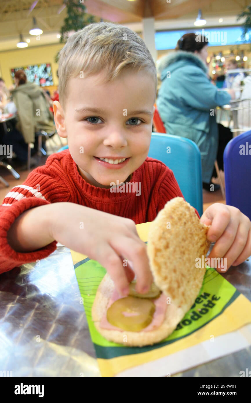 boy with burger Stock Photo - Alamy