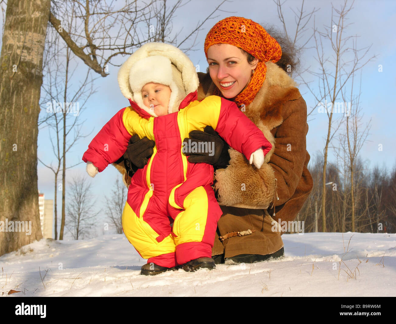 mother with baby winter Stock Photo - Alamy