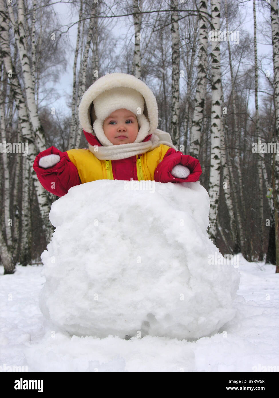 baby with snowball Stock Photo - Alamy