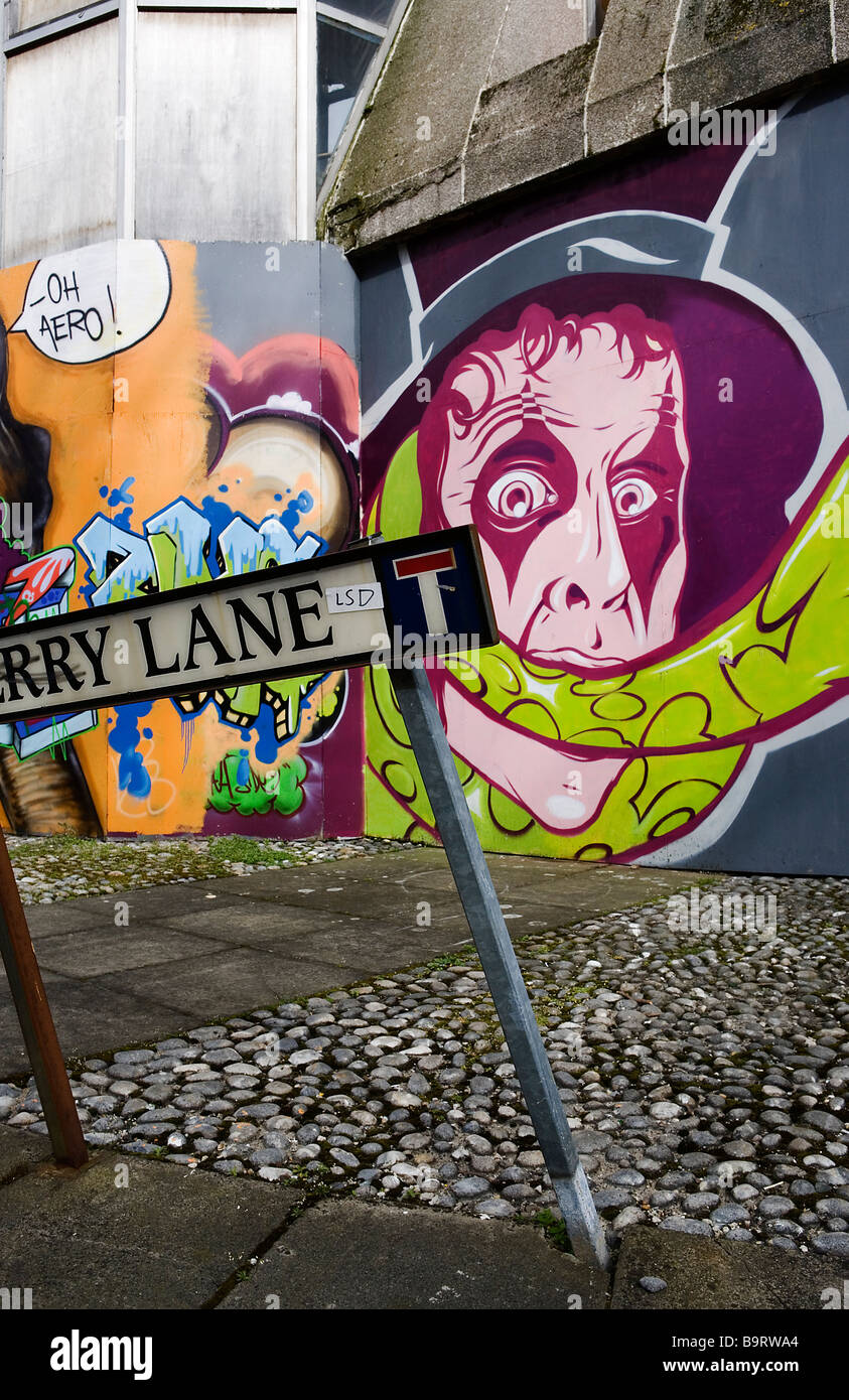 Graffiti mars a city street Stock Photo - Alamy