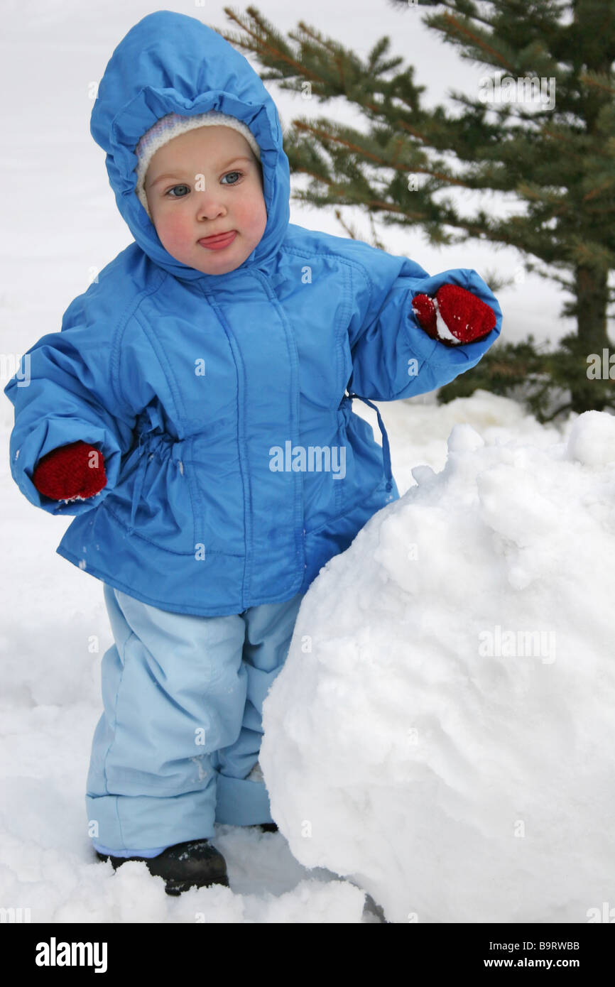 baby with snowball Stock Photo - Alamy