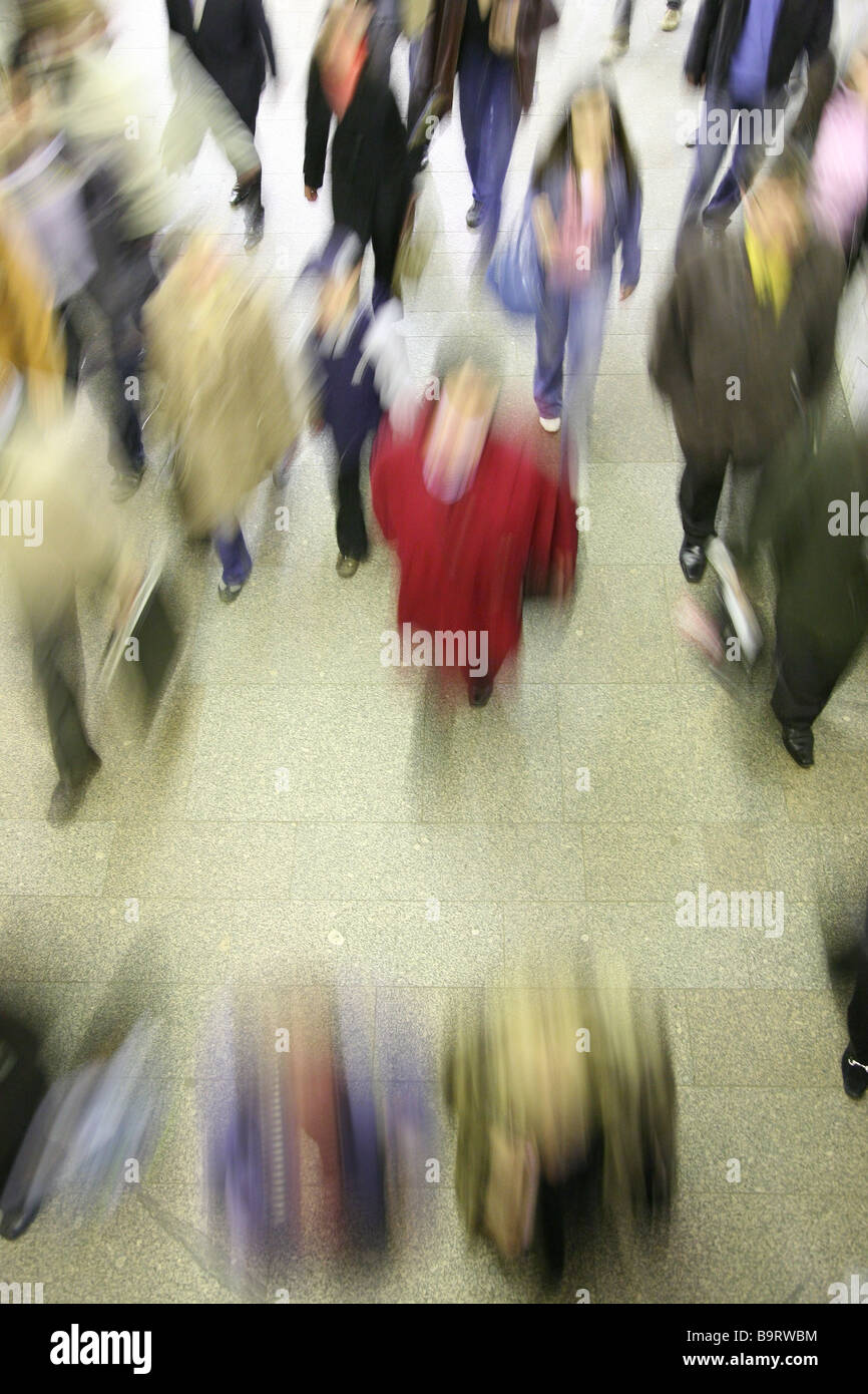 red woman in moving crowd Stock Photo - Alamy