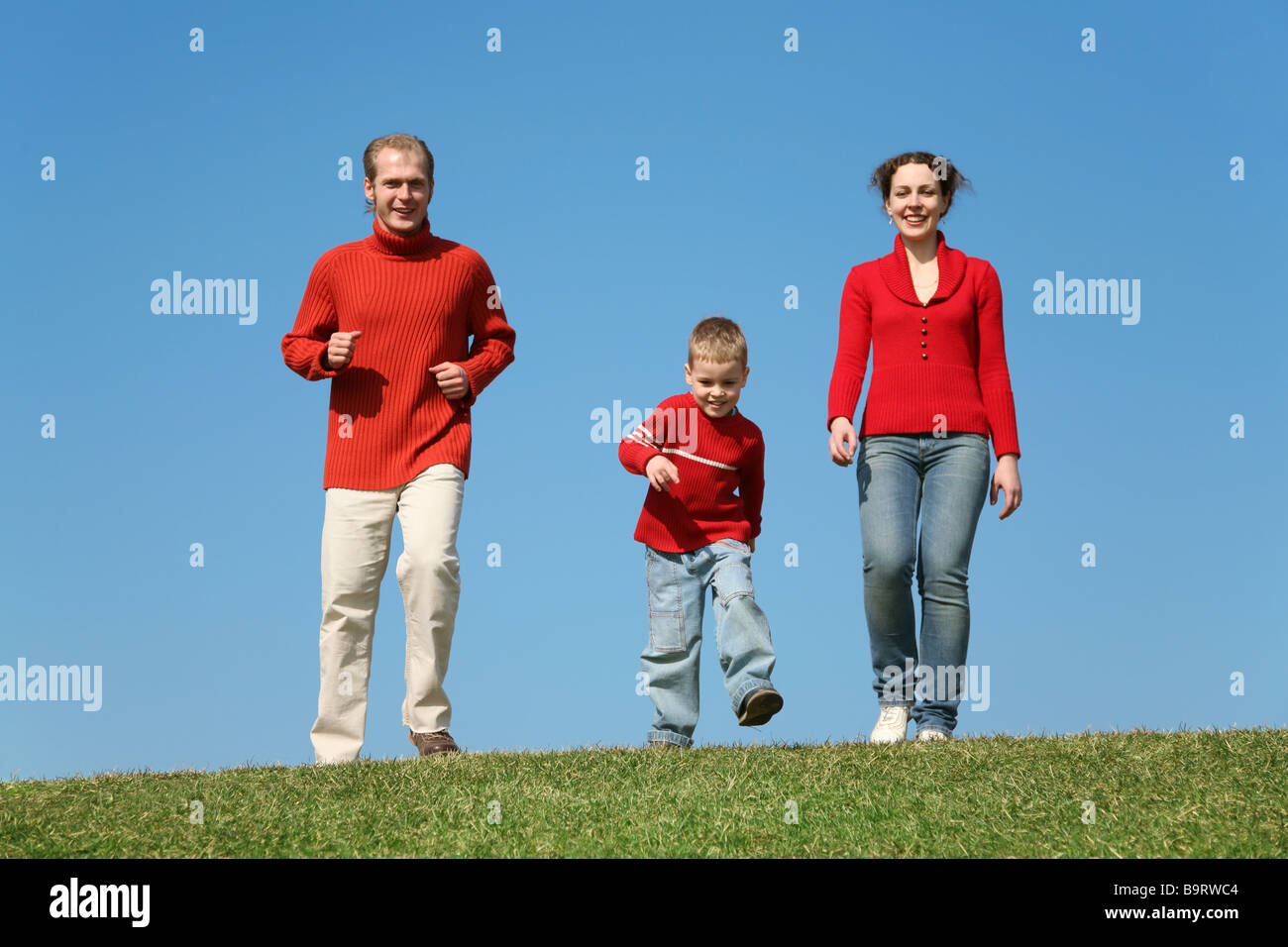 running family with son 3 Stock Photo - Alamy
