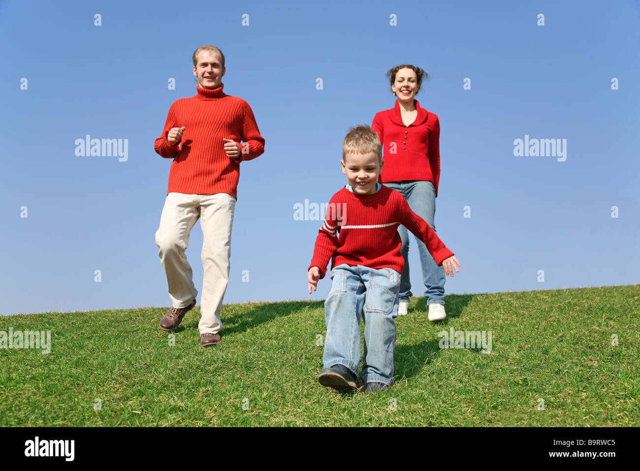 running family with son 2 Stock Photo - Alamy