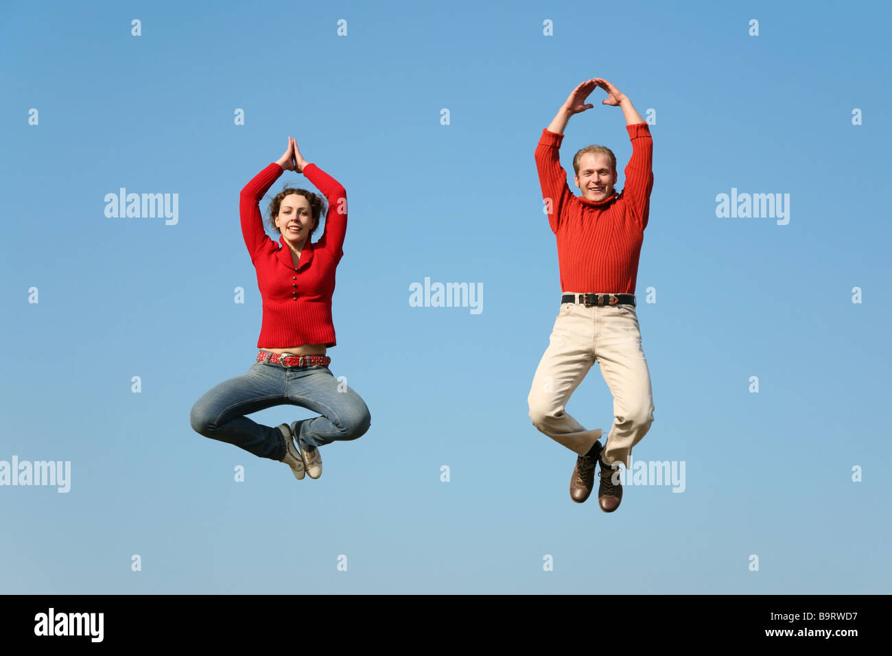 yoga fly couple Stock Photo - Alamy