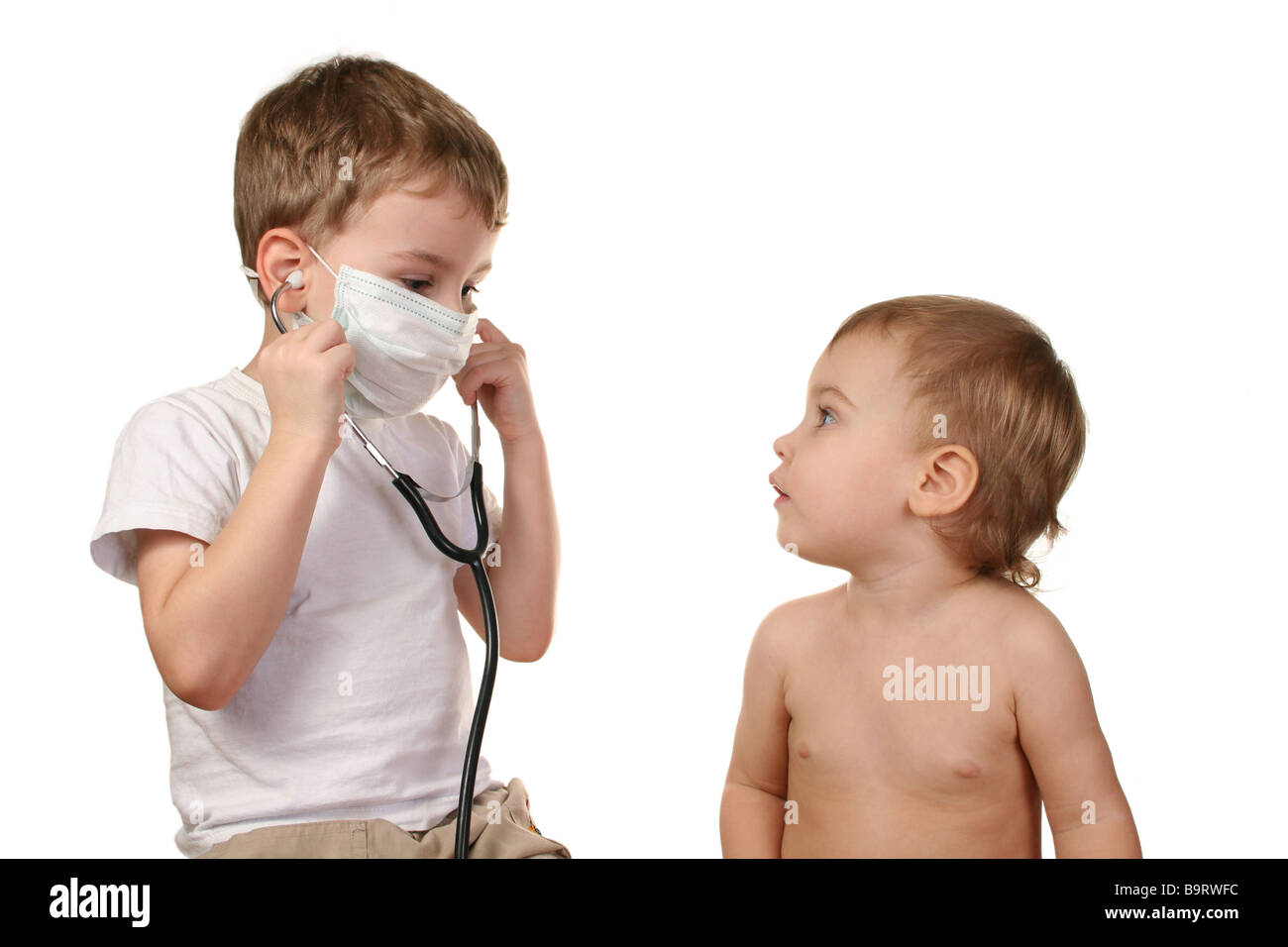 children play doctor 2 Stock Photo - Alamy