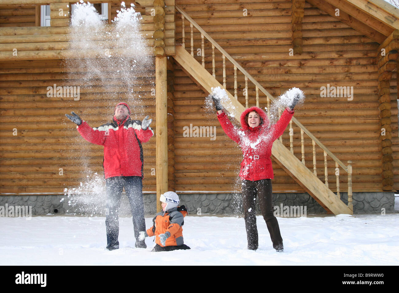 Boy girl throw snow hi-res stock photography and images - Alamy