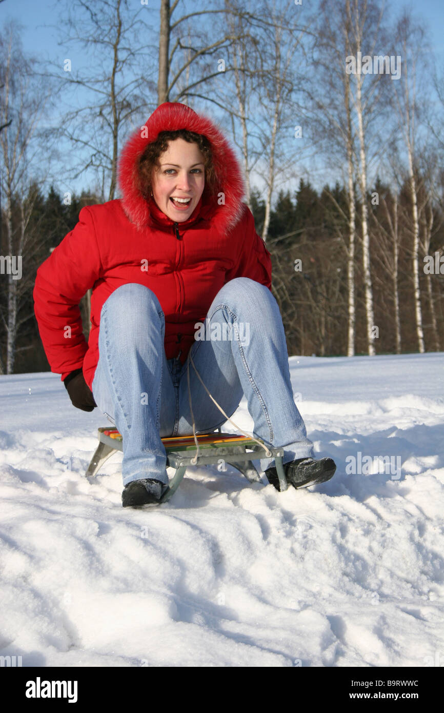 girl on sled Stock Photo - Alamy