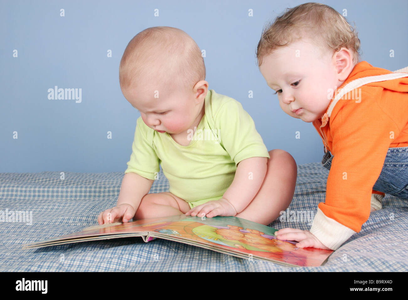 children with book Stock Photo - Alamy
