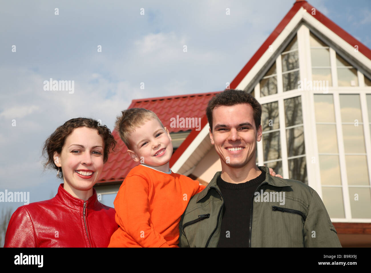 family and house Stock Photo - Alamy
