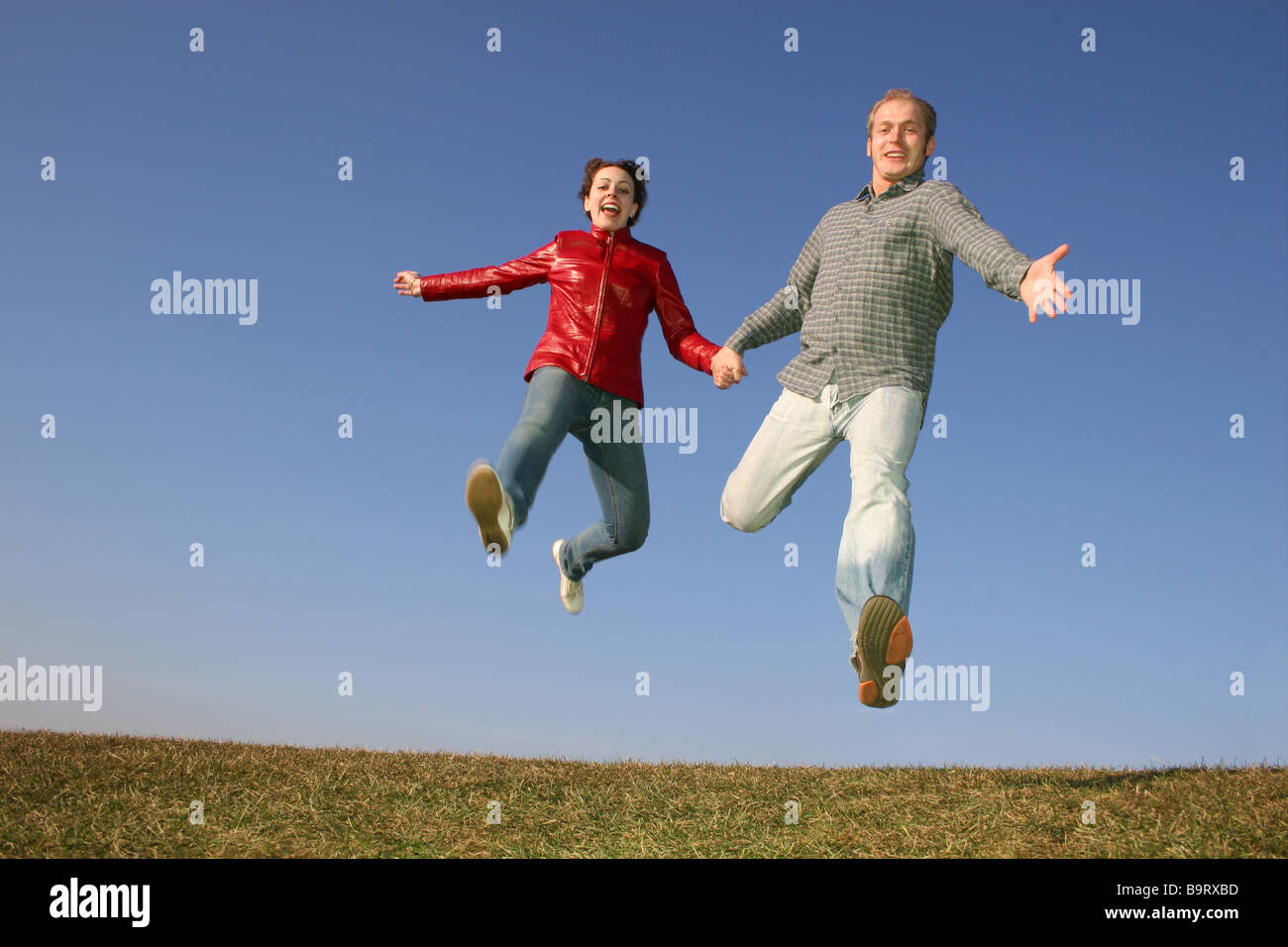 run fly jump couple Stock Photo - Alamy